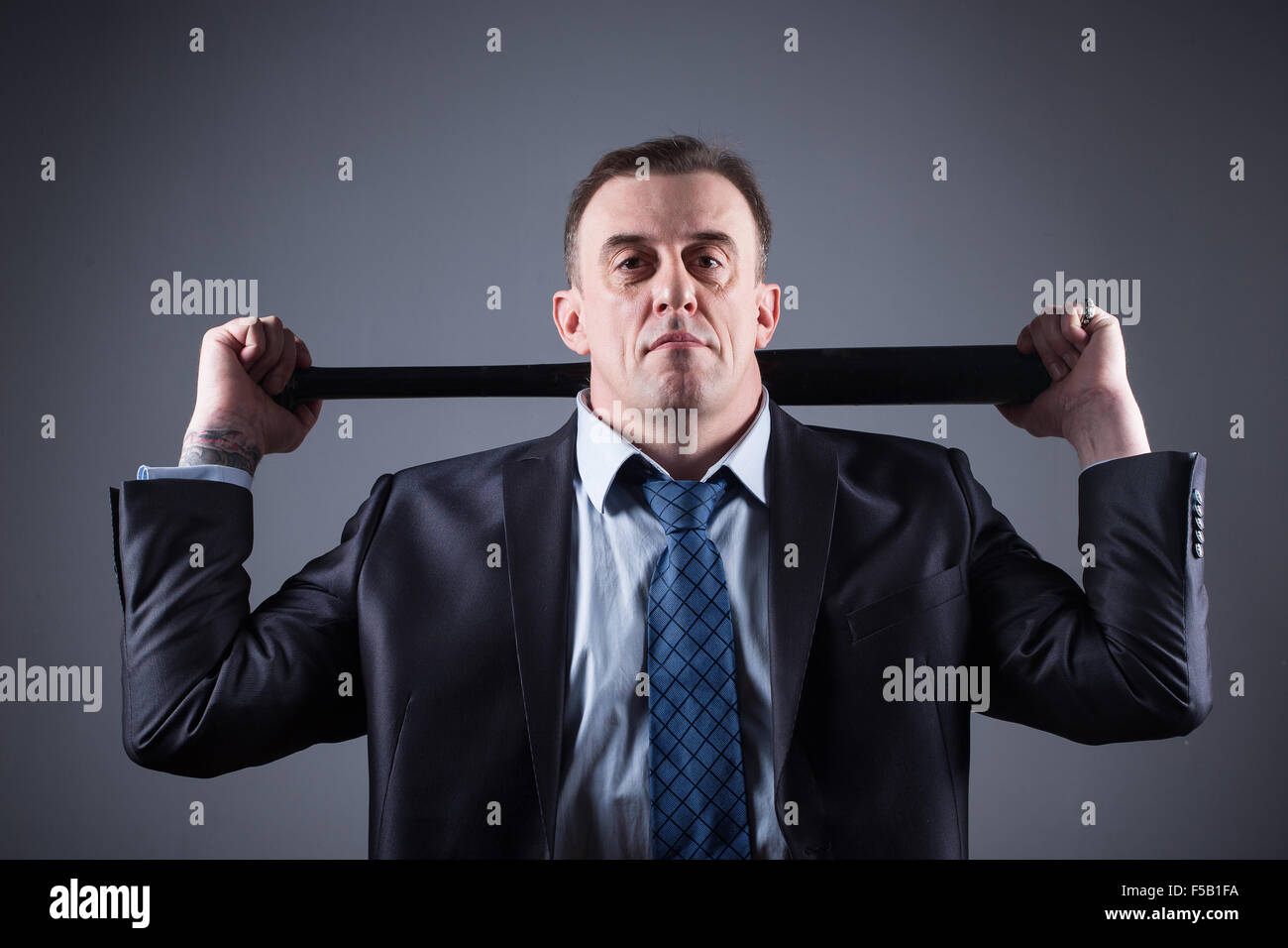 male gangster with baseball bat Stock Photo - Alamy