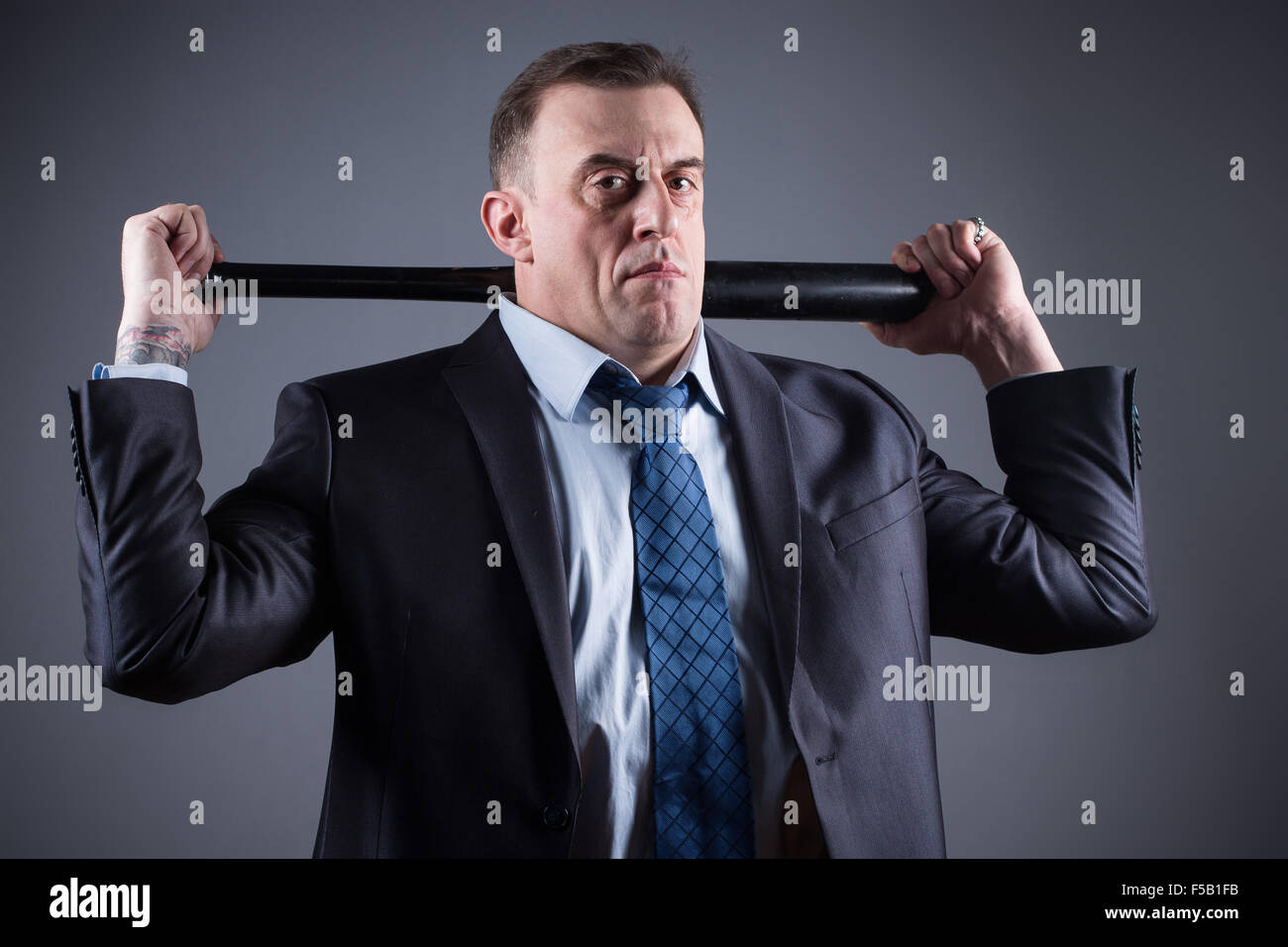 male gangster with baseball bat Stock Photo - Alamy