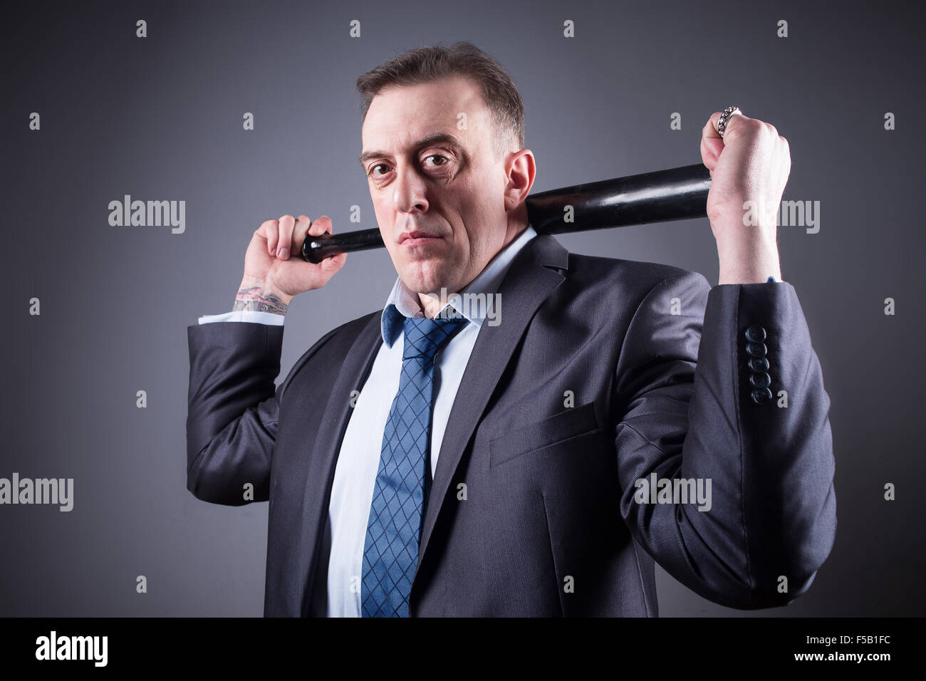 male gangster with baseball bat Stock Photo - Alamy