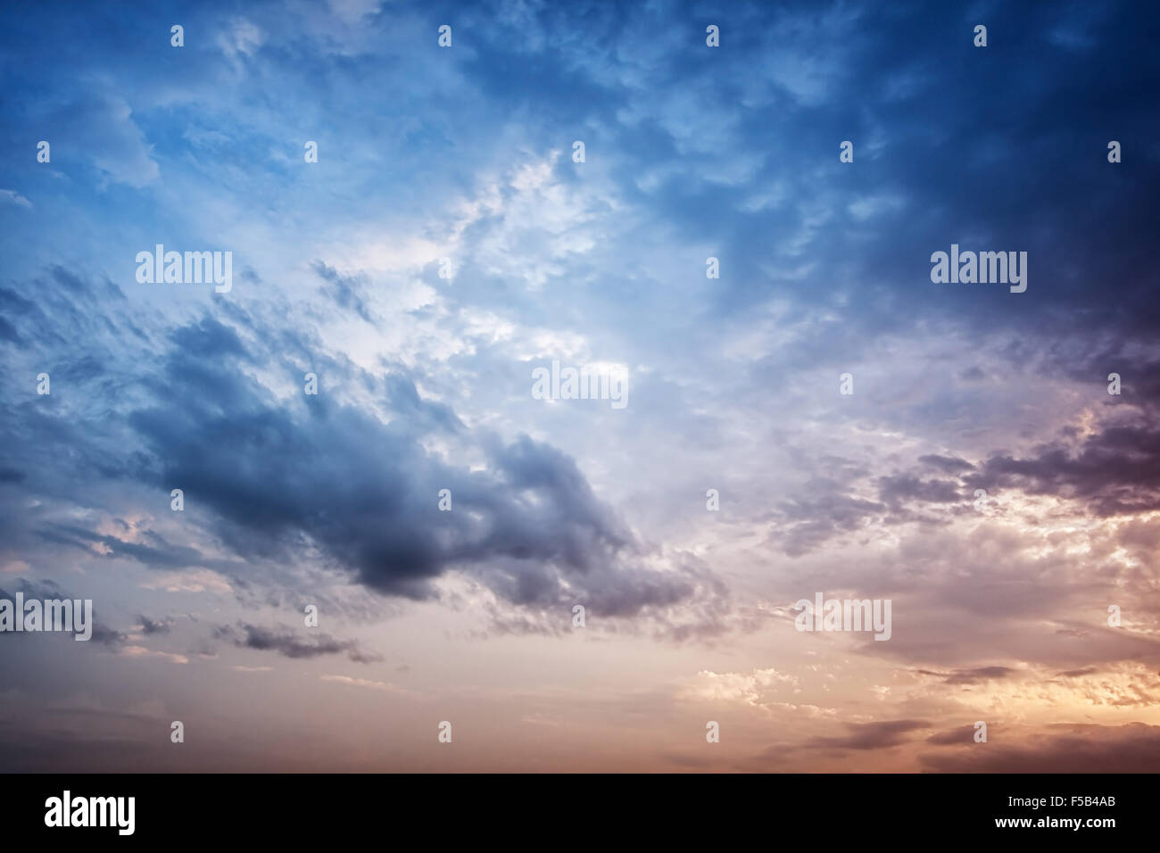 Dramatic clouds at dusk Stock Photo - Alamy