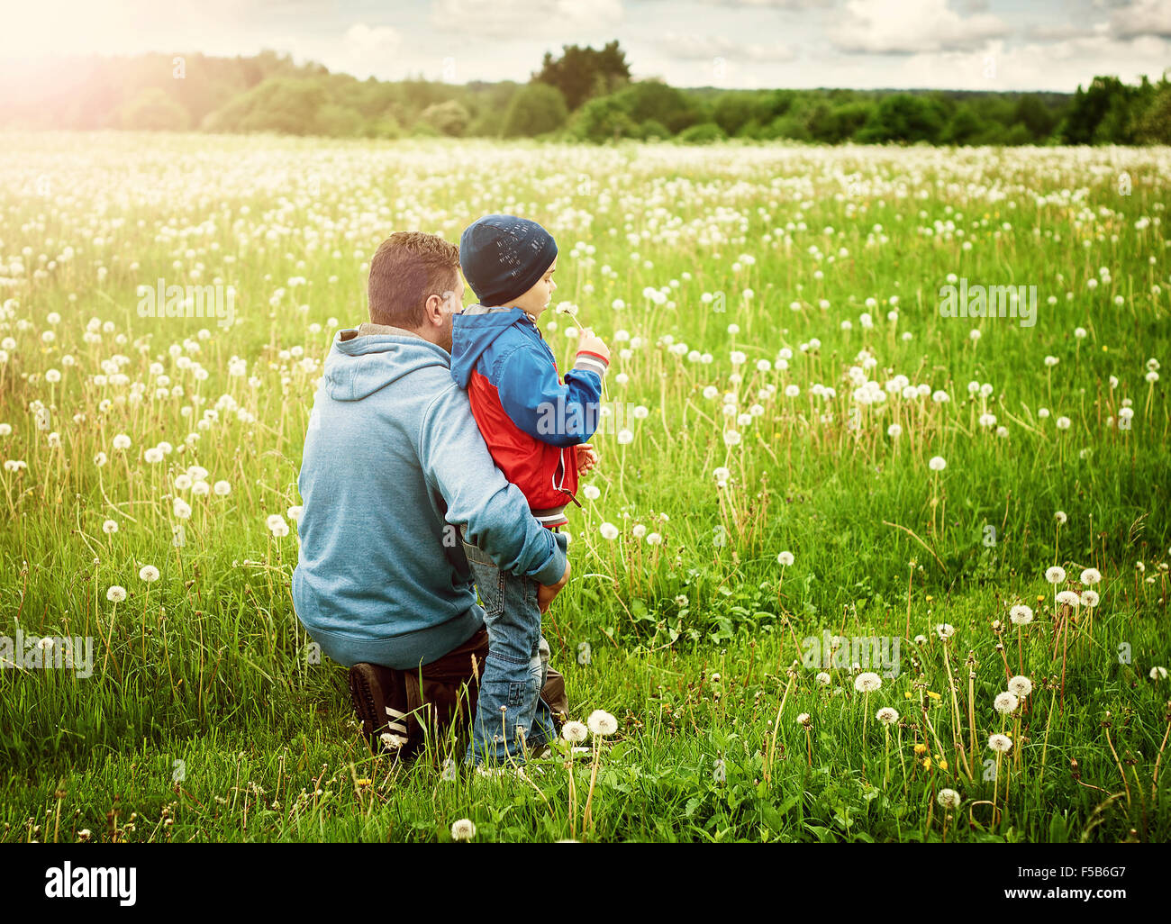 Father protecting child hi-res stock photography and images - Alamy