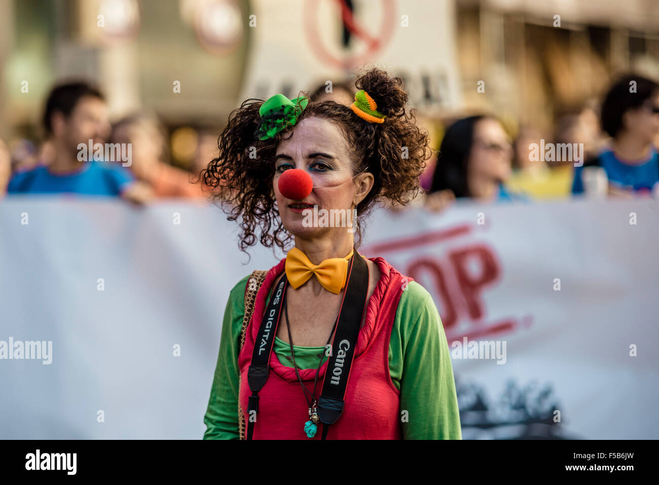 October 31st, 2015. Barcelona, Spain: A demonstrator dressed as a clown ...