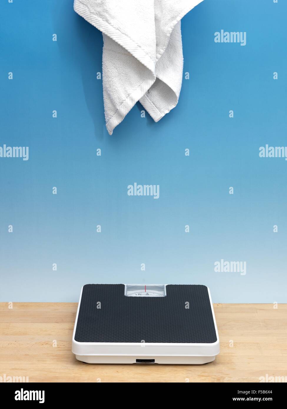 A studio photo of a set of body scales on tiles Stock Photo - Alamy