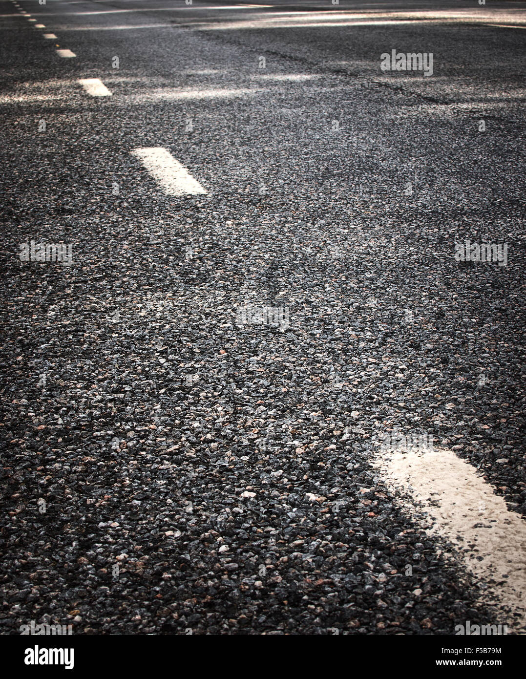 Asphalt road and dividing lines Stock Photo - Alamy