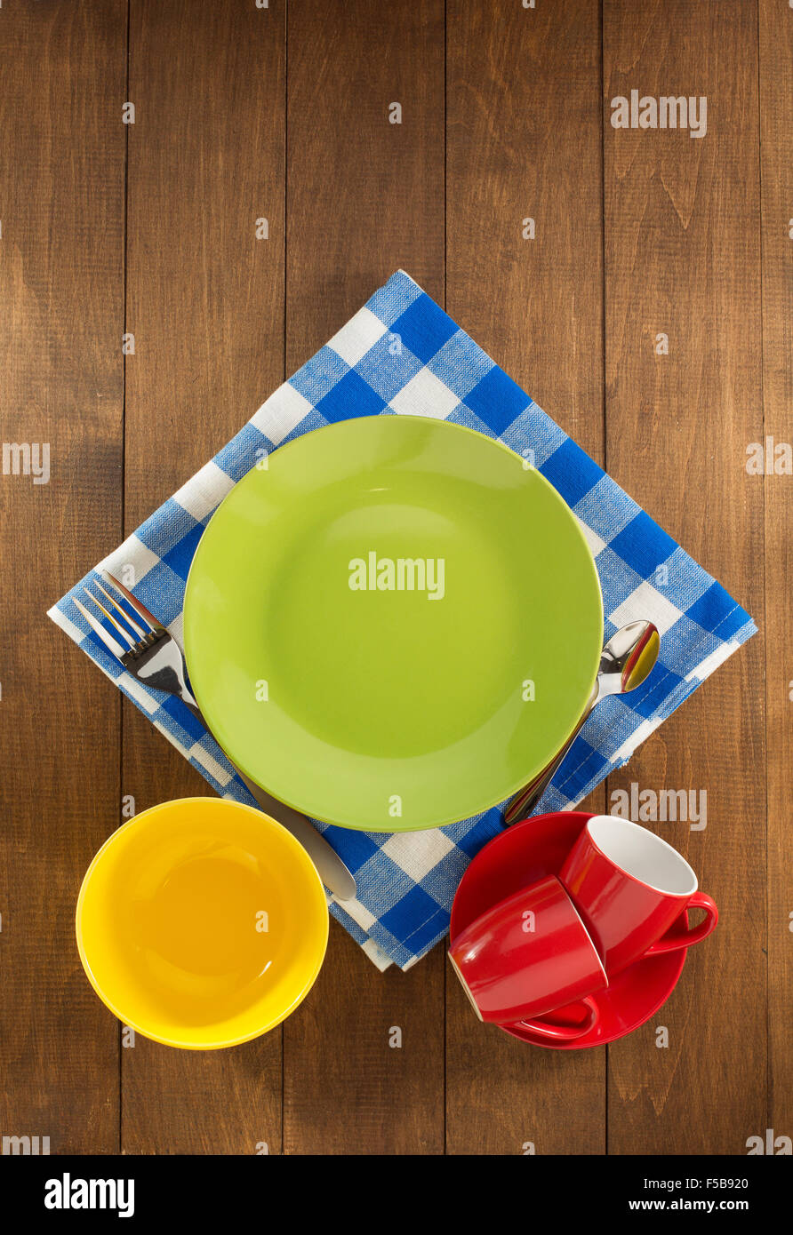 dishes set on wooden background Stock Photo - Alamy