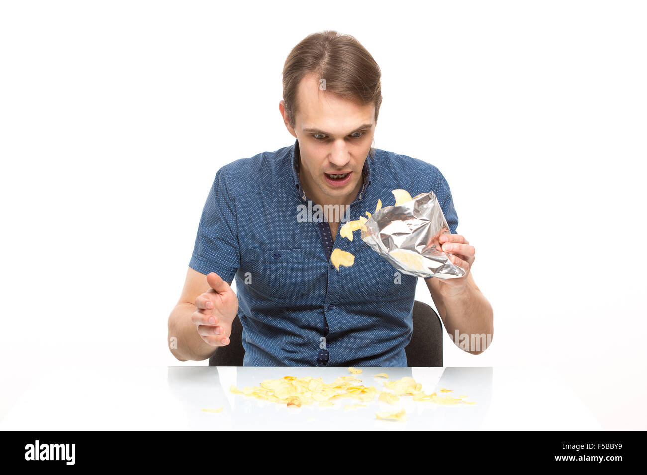 Food man table not happy Cut Out Stock Images & Pictures - Alamy
