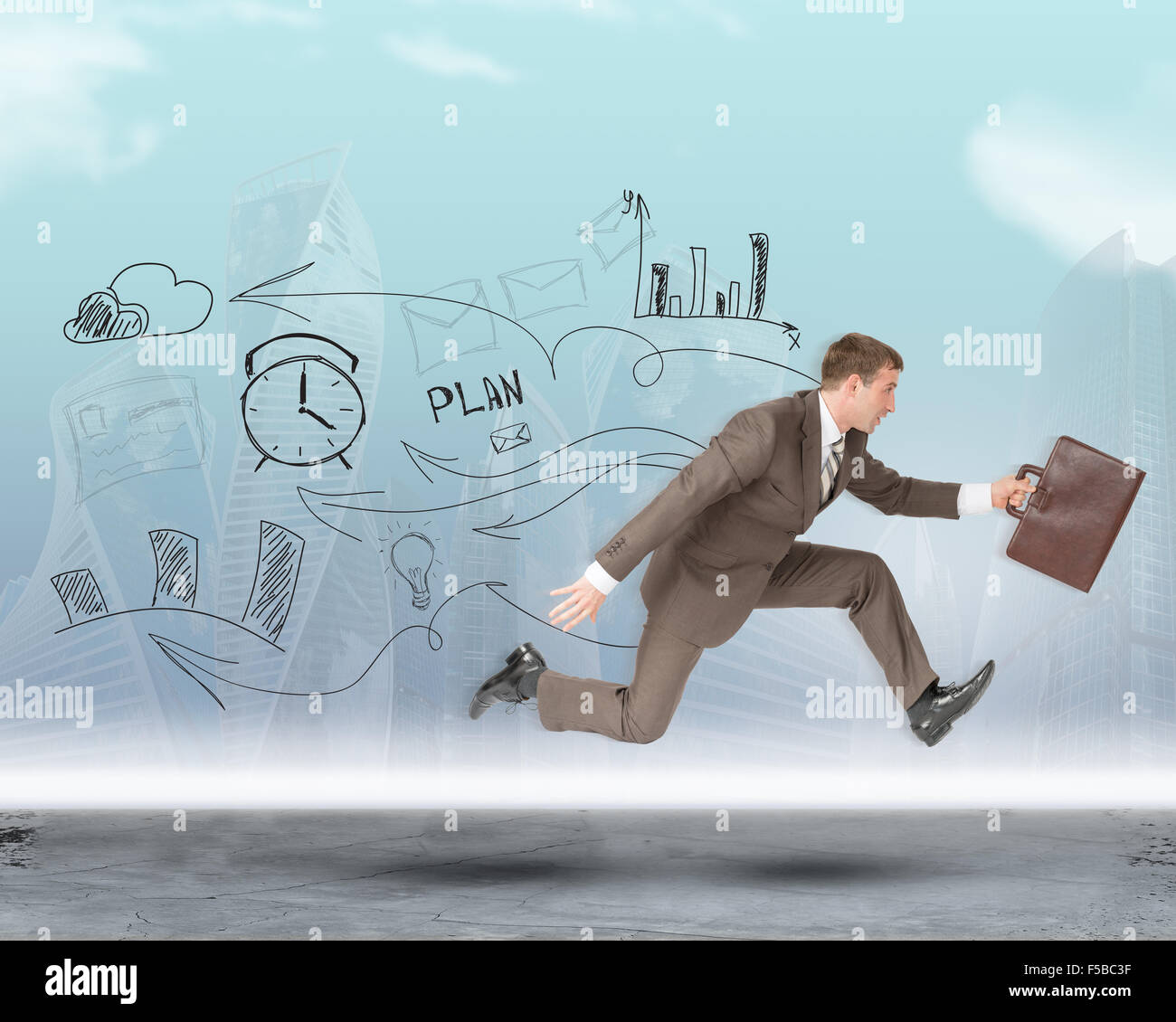 Businessman running with suitcase Stock Photo - Alamy