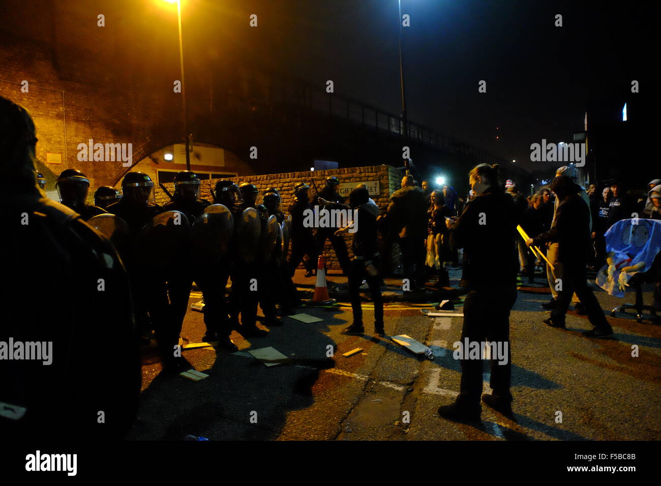 Riot police block road in Lambeth outside illegal Halloween rave Stock ...
