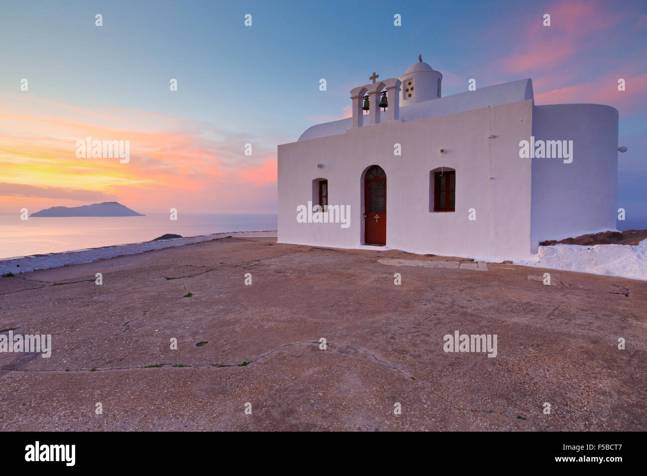 Church atop a hill over Plaka village, Milos island, Greece Stock Photo ...