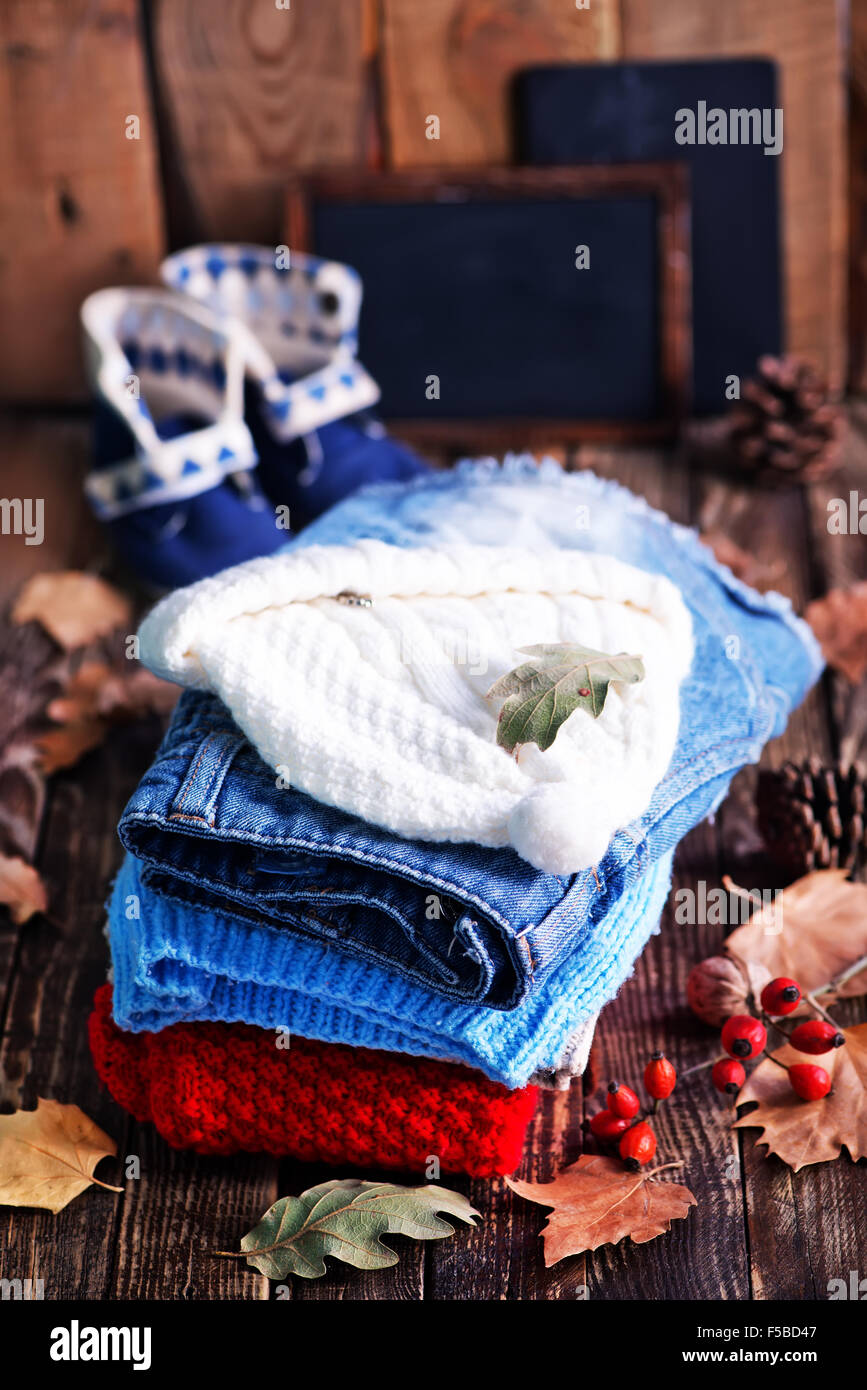 baby clothes on a table, autumn baby clothes Stock Photo - Alamy