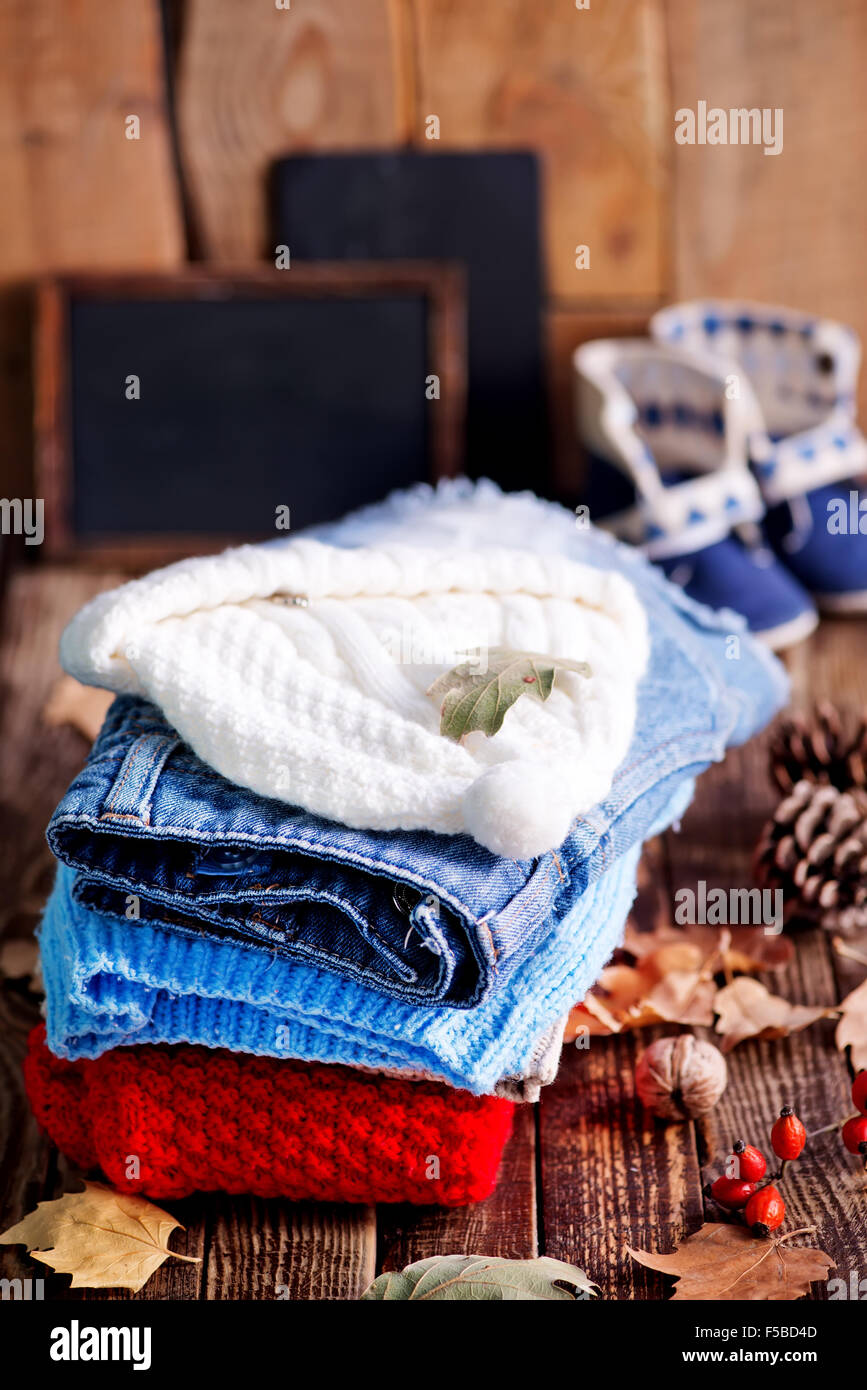 baby clothes on a table, autumn baby clothes Stock Photo - Alamy