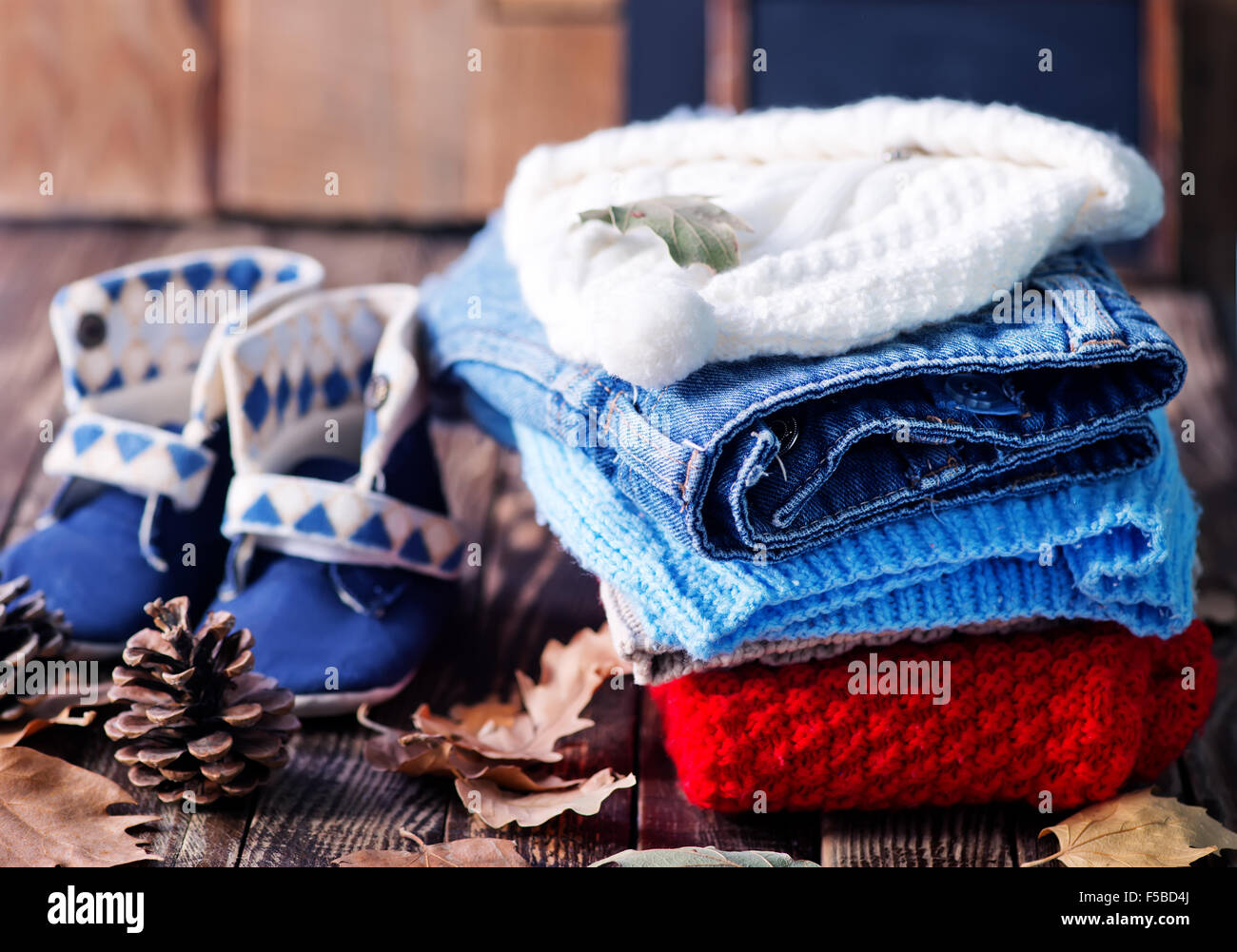 baby clothes on a table, autumn baby clothes Stock Photo - Alamy