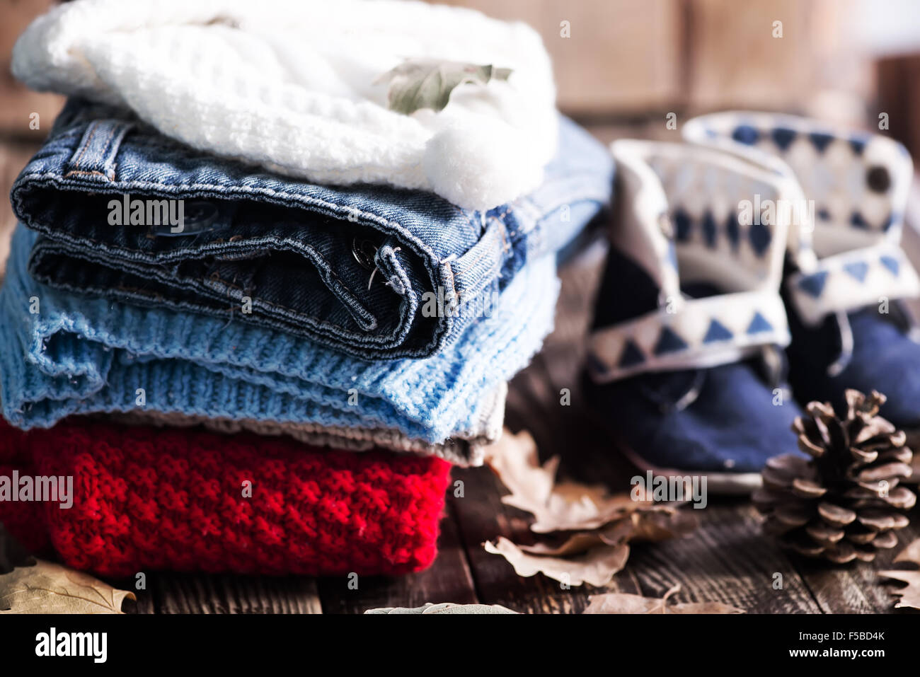 baby clothes on a table, autumn baby clothes Stock Photo - Alamy