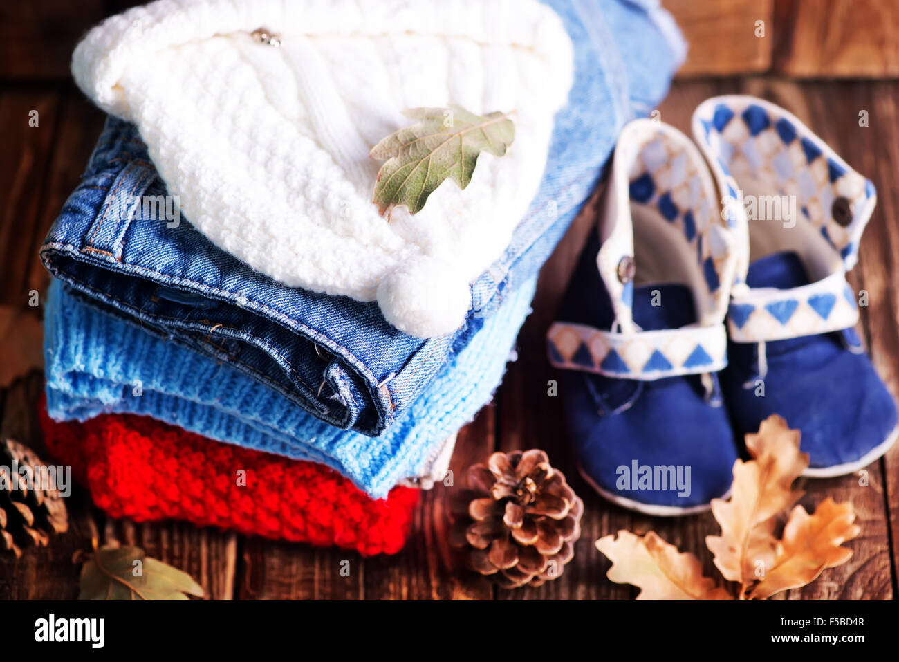 baby clothes on a table, autumn baby clothes Stock Photo - Alamy