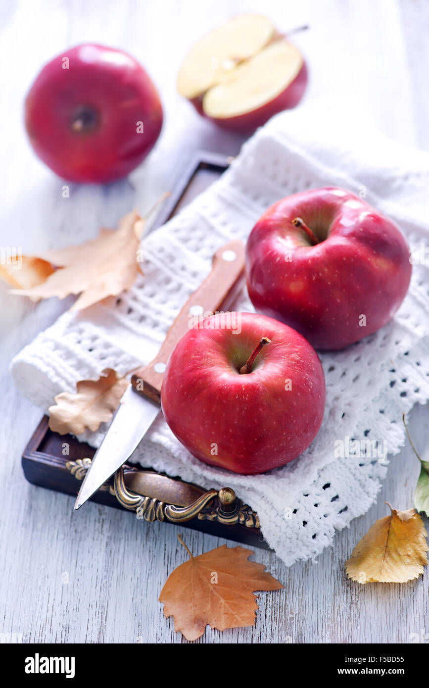 autumn baby clothes on the wooden table Stock Photo - Alamy