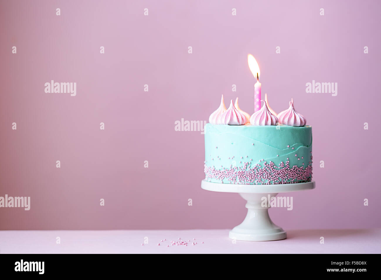 Birthday cake with one candle Stock Photo - Alamy