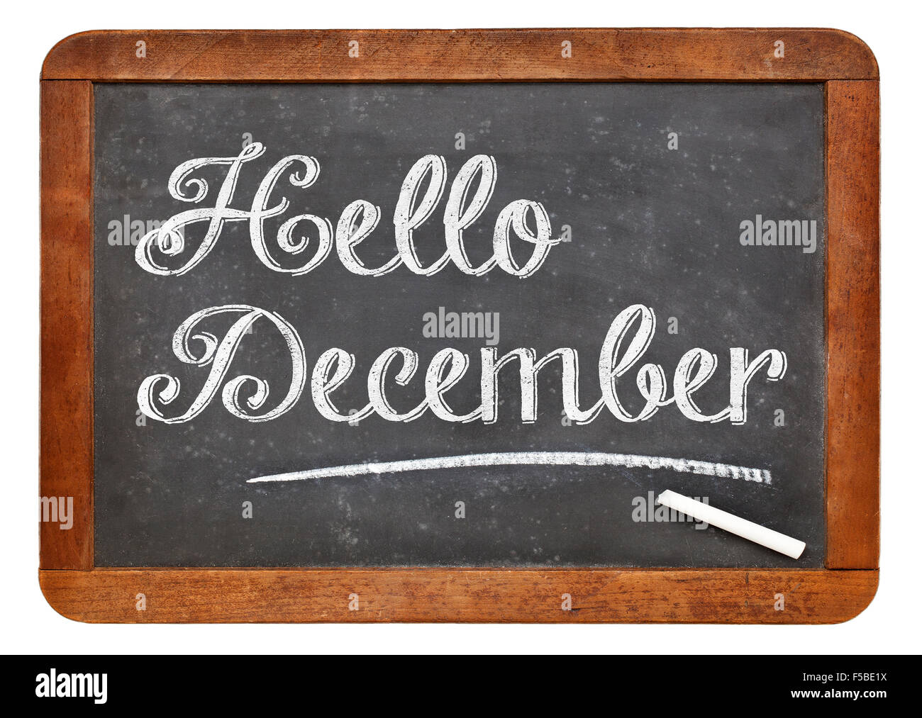 Hello December sign - white chalk text on an isolated vintage slate ...