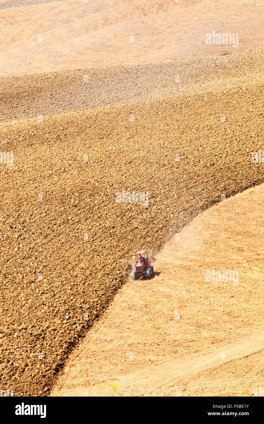 Italy Tuscany Le Crete - Agriculture - Tractor Plowing Field Stock ...