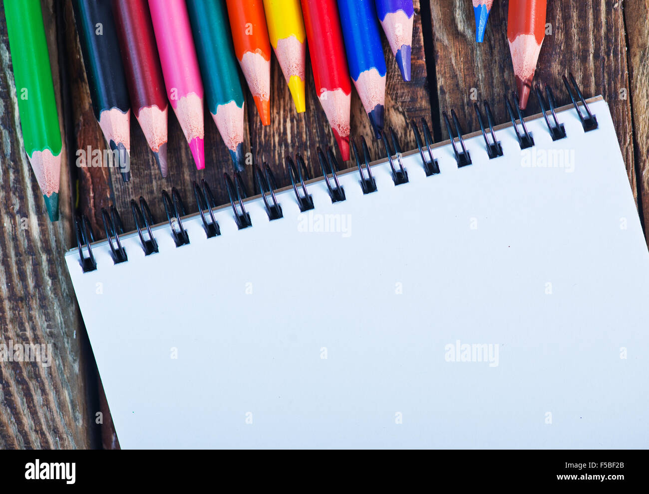 empty note and color pencils for draw Stock Photo - Alamy
