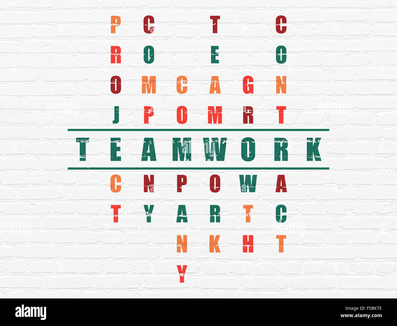 Finance concept: Teamwork in Crossword Puzzle Stock Photo - Alamy