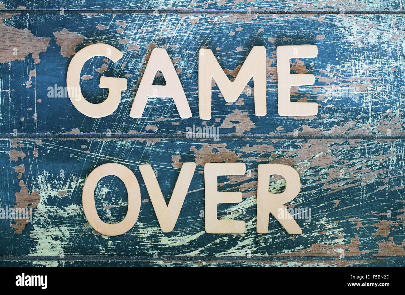 Game over written with wooden letters on rustic wooden surface Stock ...