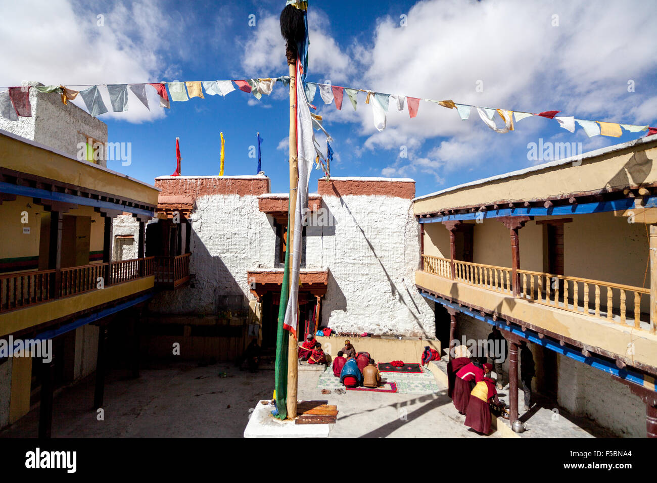 Buddhist monks reading religious scrolls at the courtyard of the Hanle ...