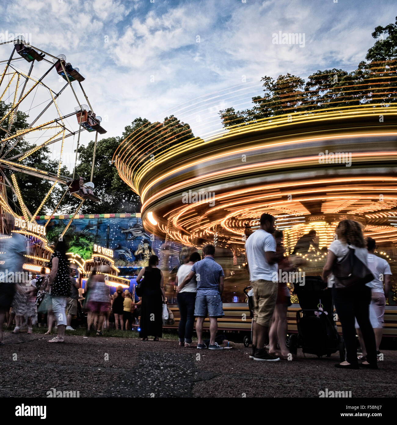 carousel spinning light trail Stock Photo - Alamy