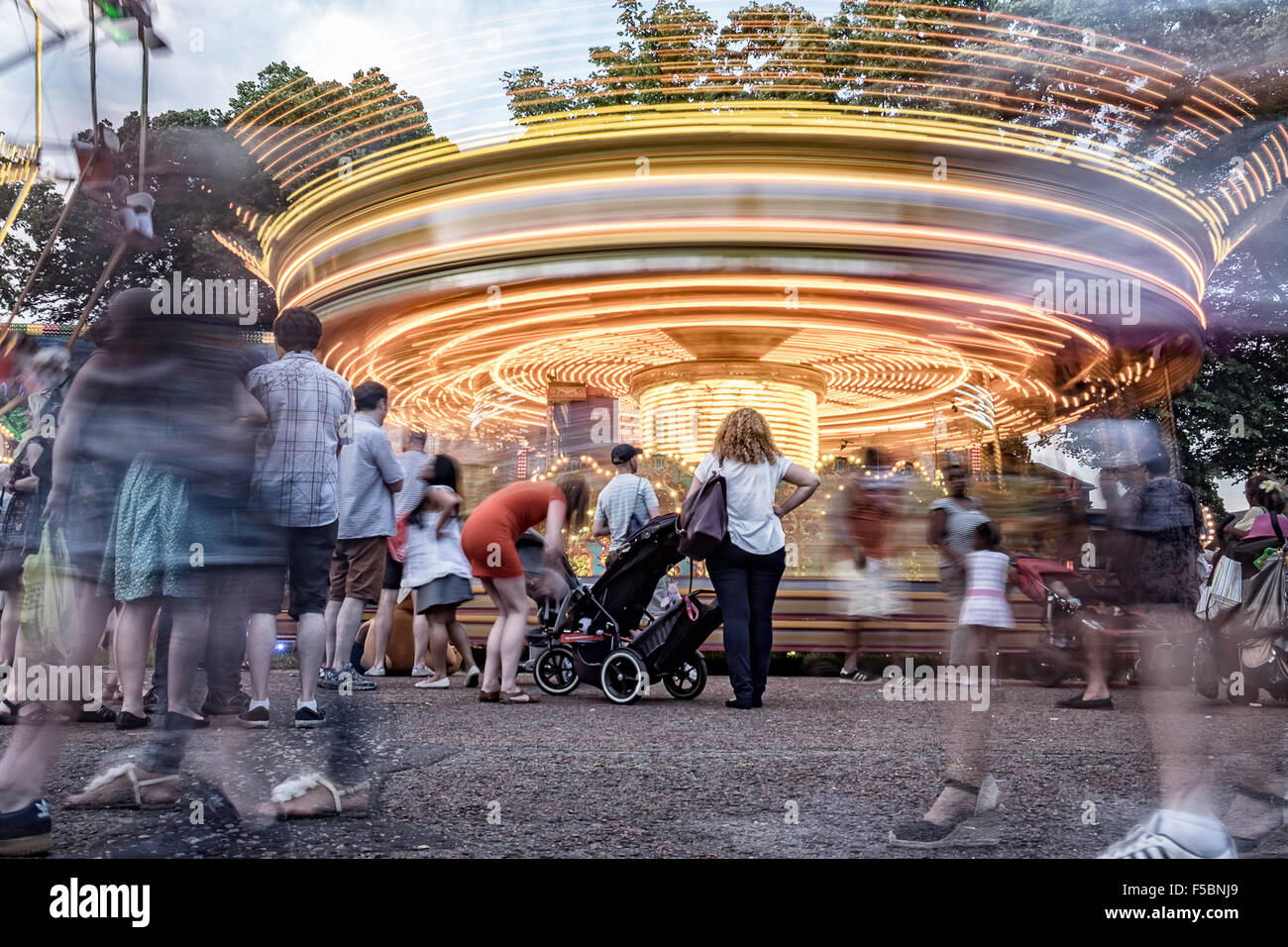 carousel spinning light trail Stock Photo - Alamy