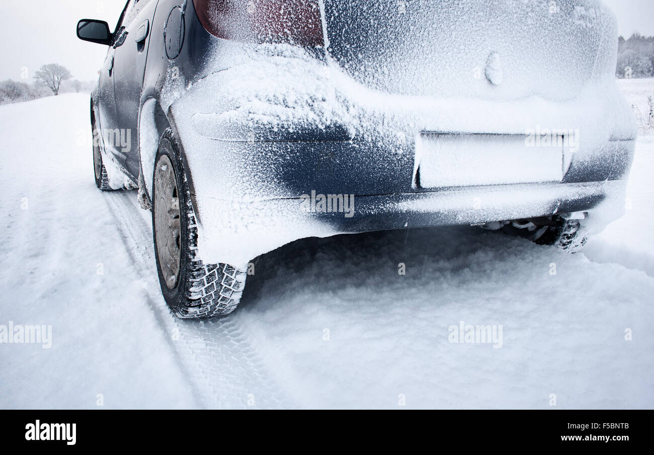Car on snowy road Stock Photo - Alamy