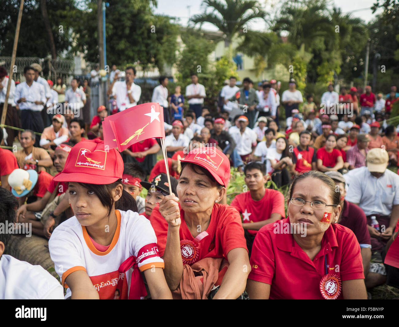 Yangon, Yangon Division, Myanmar. 1st Nov, 2015. Women listen to Aung ...