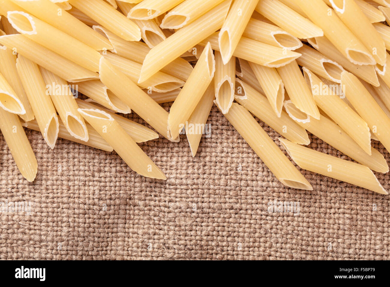 raw the pasta closeup on vintage background Stock Photo - Alamy