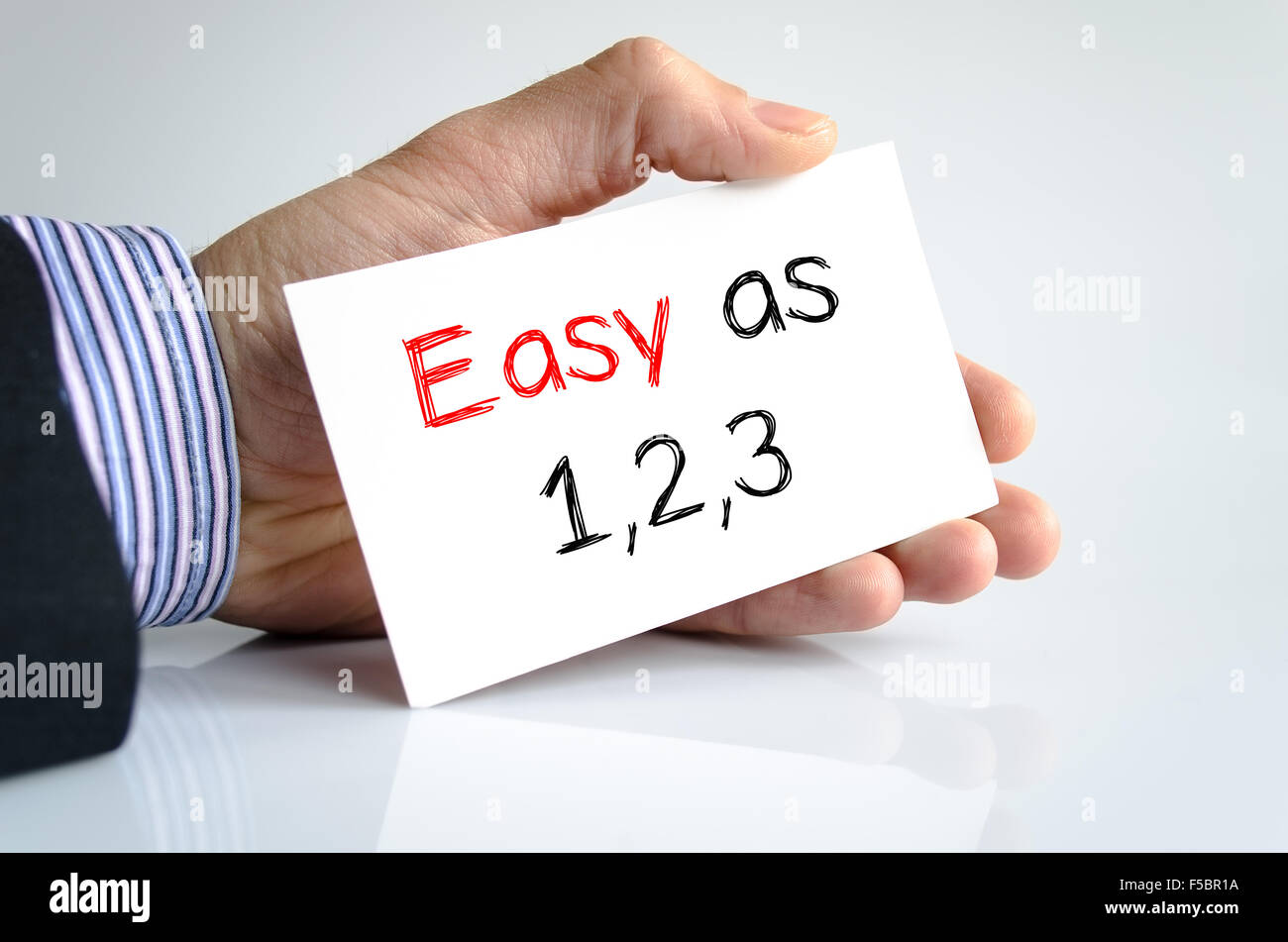 Easy text concept isolated over white background Stock Photo - Alamy