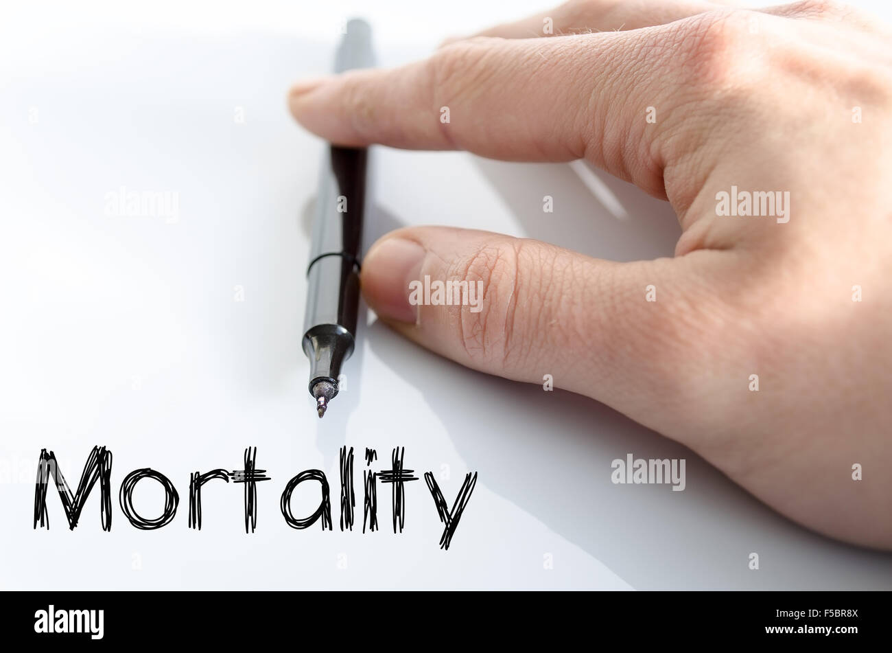Mortality text concept isolated over white background Stock Photo - Alamy