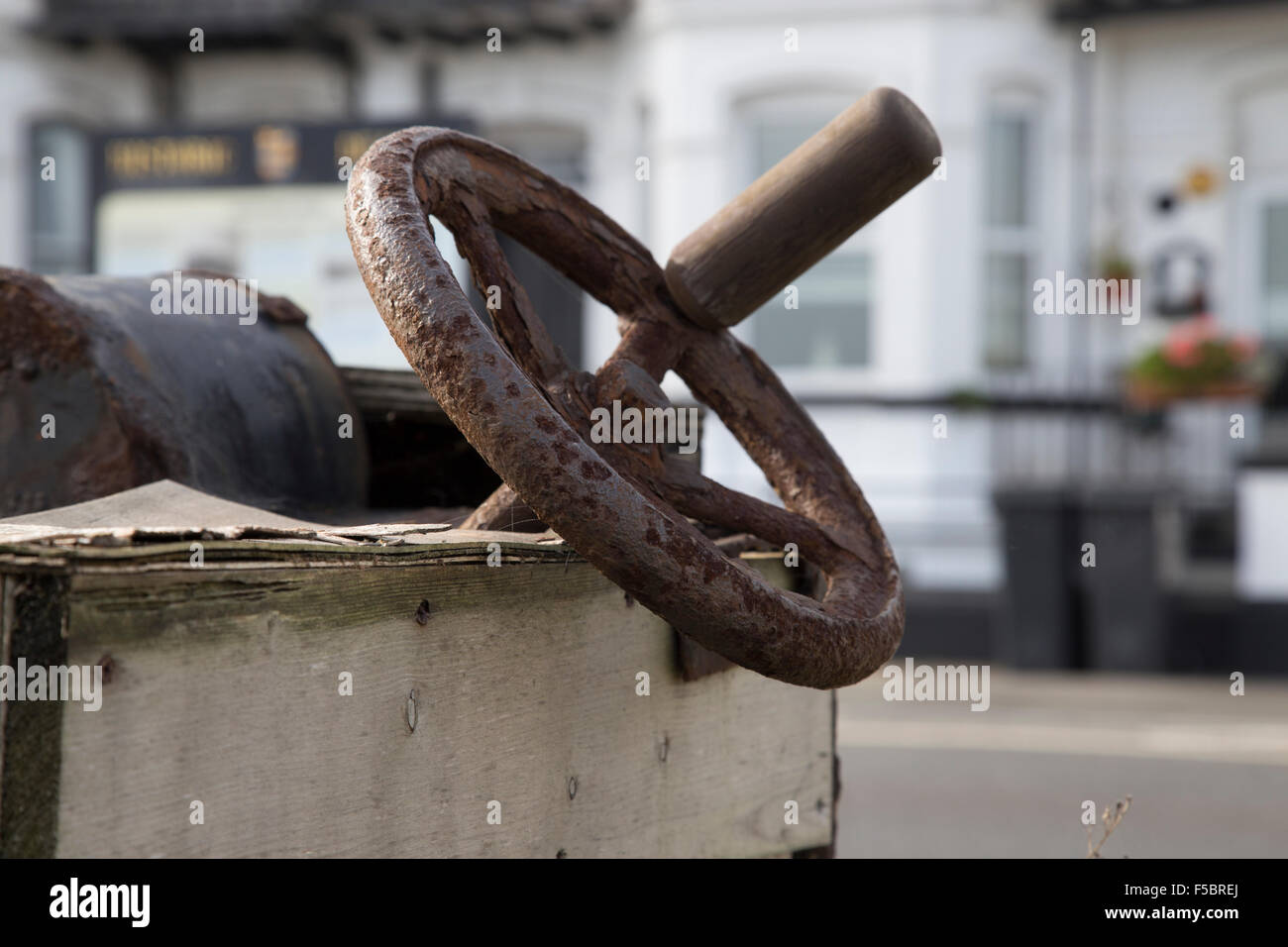 Rusted spare metal steering wheel with holding handle Stock Photo - Alamy
