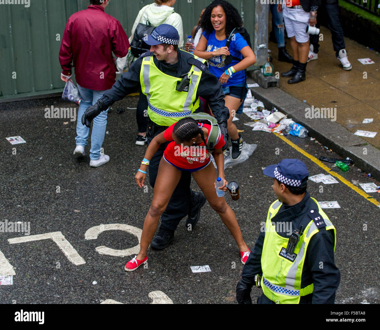 A police officer gets a whining during Notting Hill Carnival 2015 ...