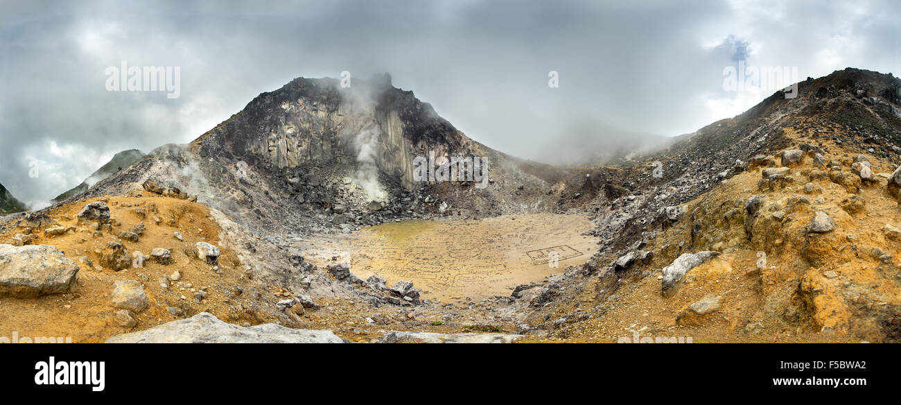 Volcano panorama with a dramatic sky. Sibayak volcano near Berastagi in ...