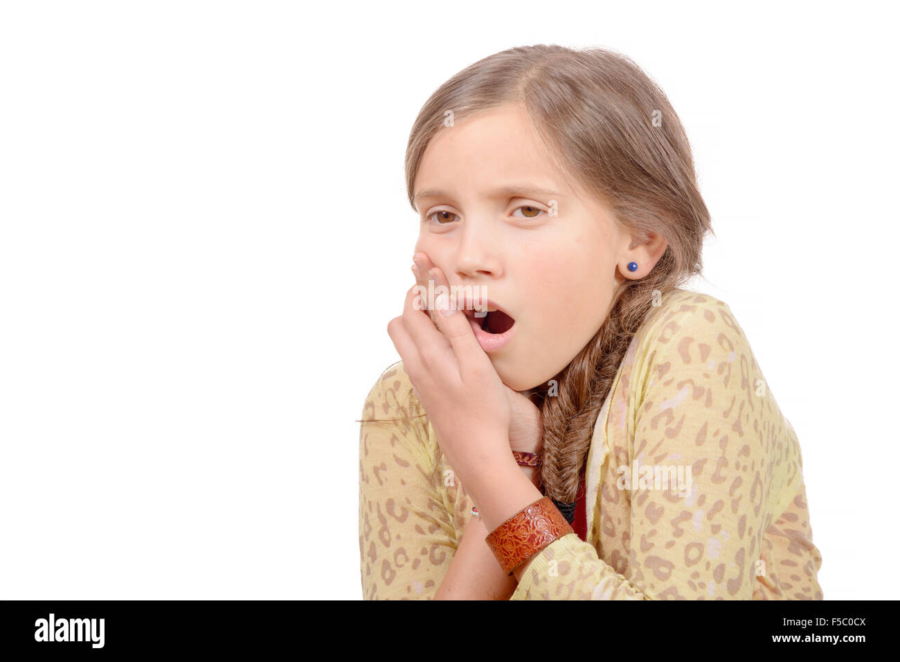 Beautiful little girl with a toothache Stock Photo - Alamy