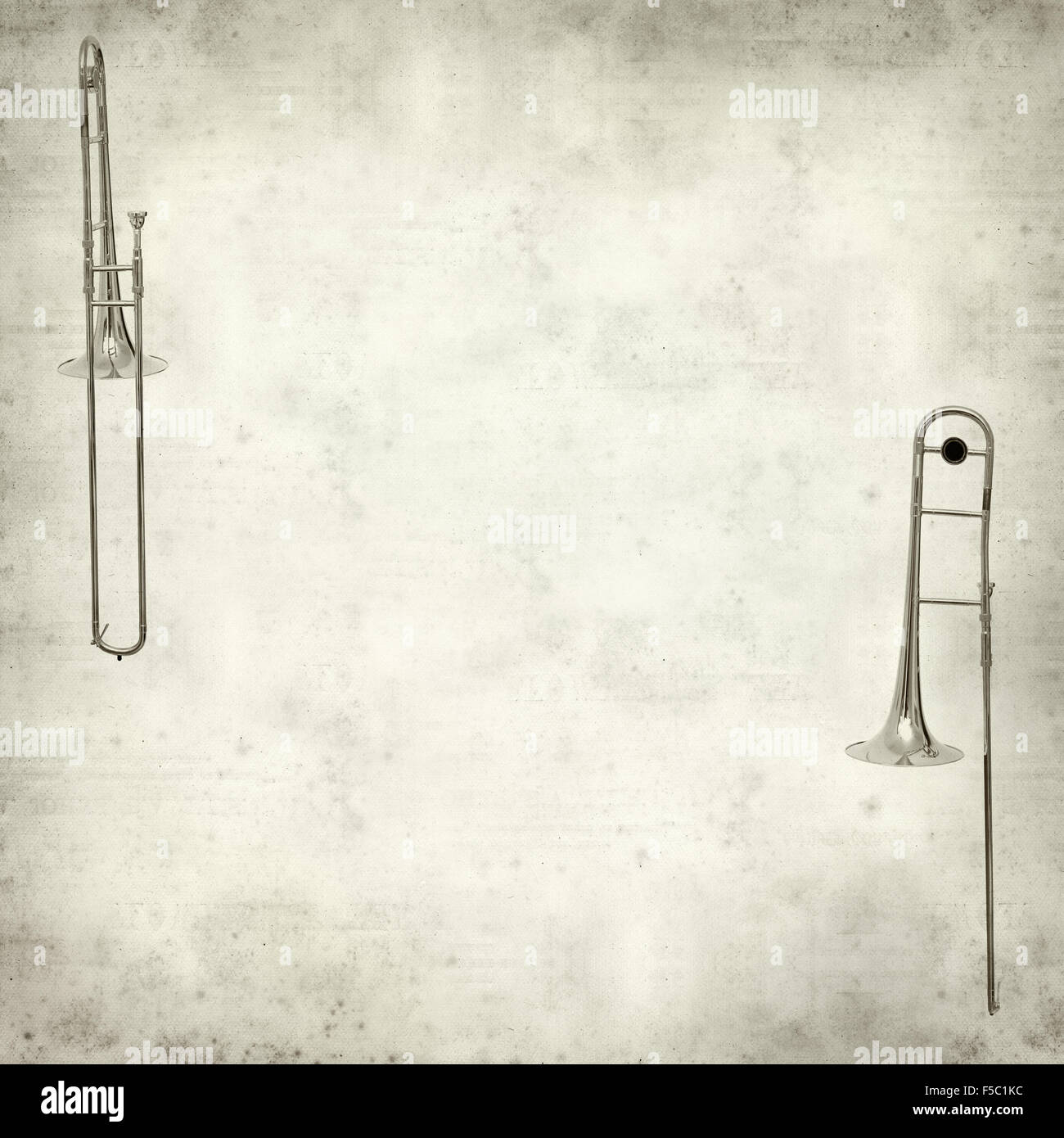 textured old paper background with silver trombone Stock Photo - Alamy
