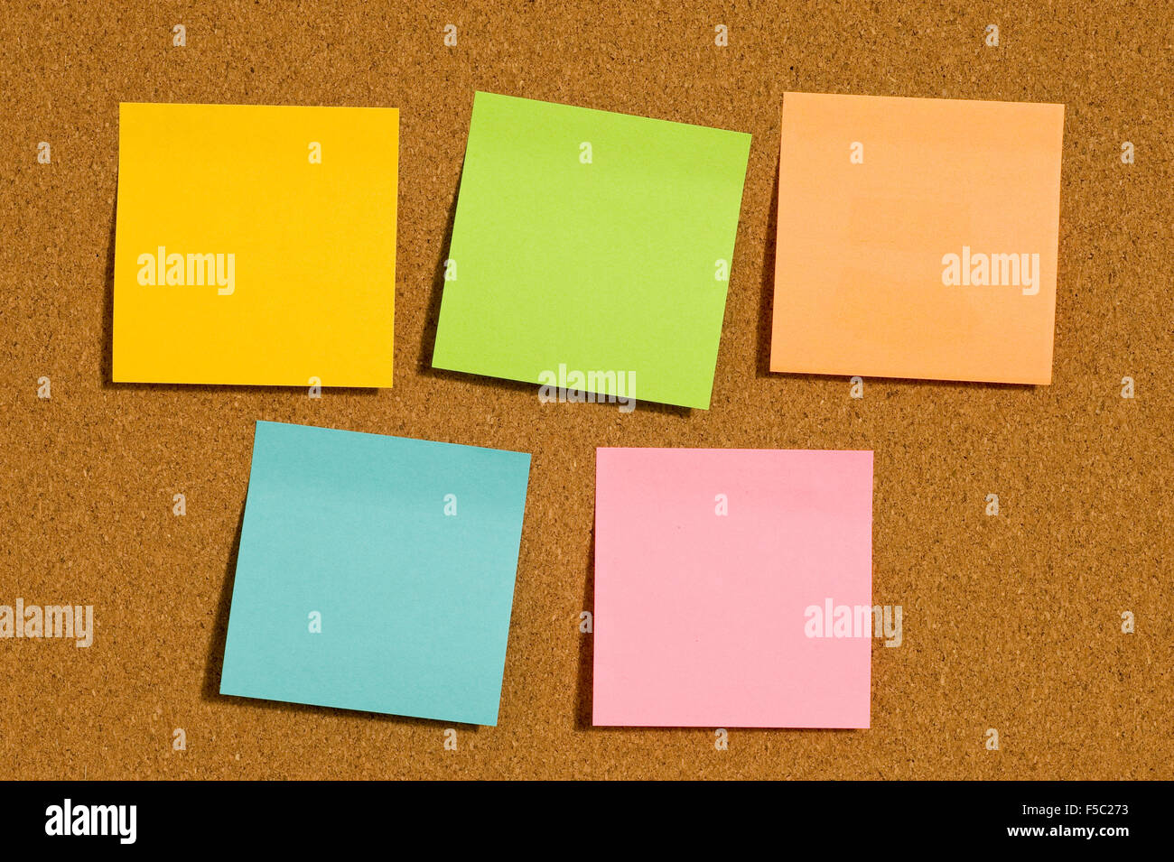 Corkboard With Five Blank Post it Notes Stock Photo - Alamy