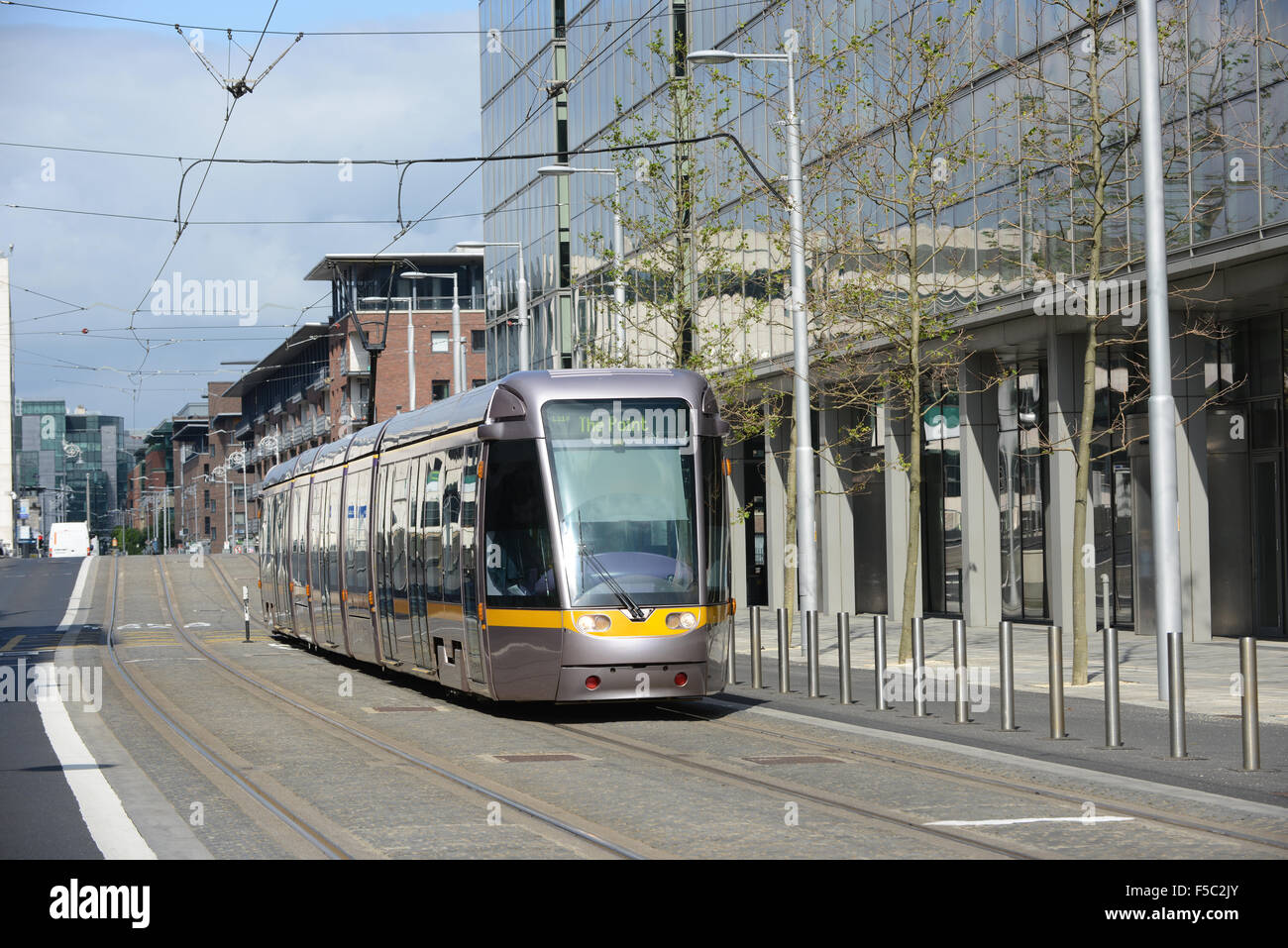 Luas red line tram heading for The Point terminal in Dublin, Ireland ...