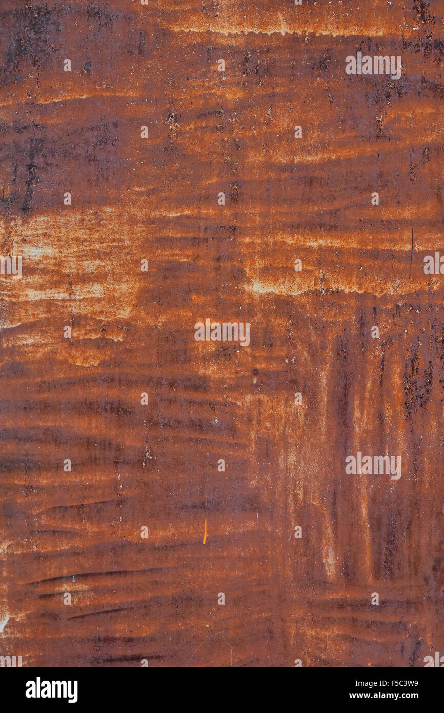 Bright rust stained corroded metal surface with uneven paint Stock ...