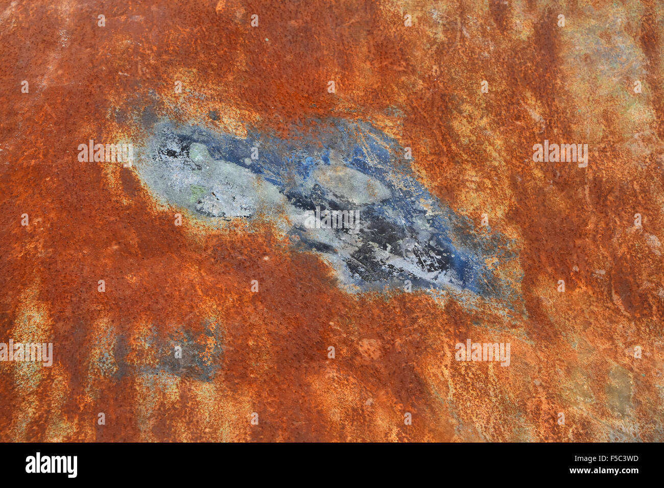 Bright rust stained corroded metal surface with uneven paint Stock ...