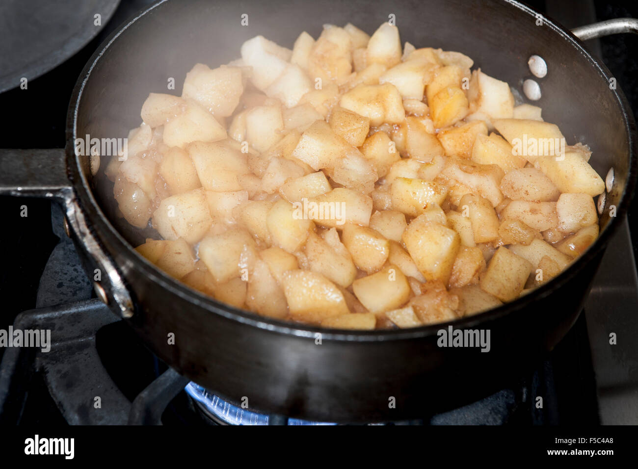 Apples Cooking on Stove Stock Photo - Alamy