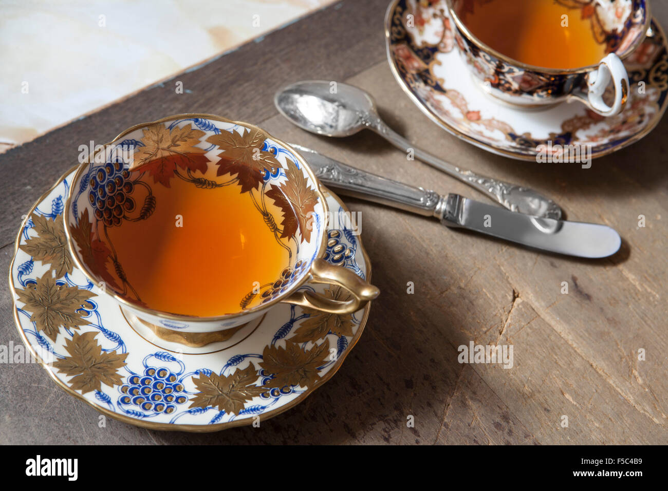 Two Cups of Tea on Rustic Table Stock Photo - Alamy