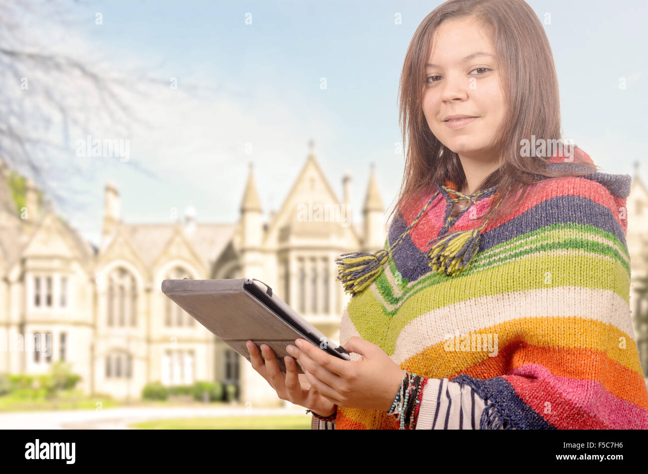 Nice female student smiling Stock Photo - Alamy