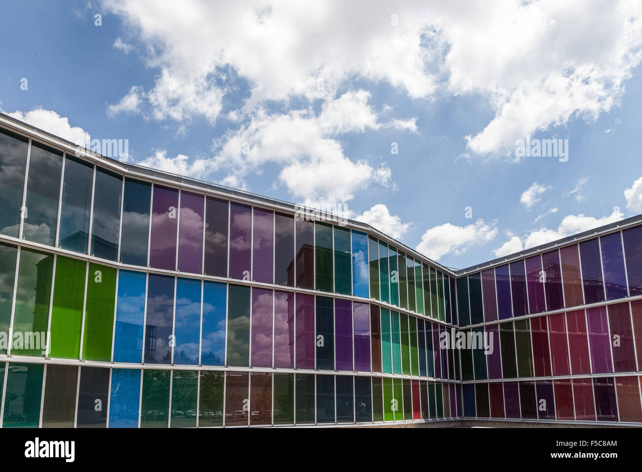 the colorful and reflective Museum of Modern Art, the windows reflect ...