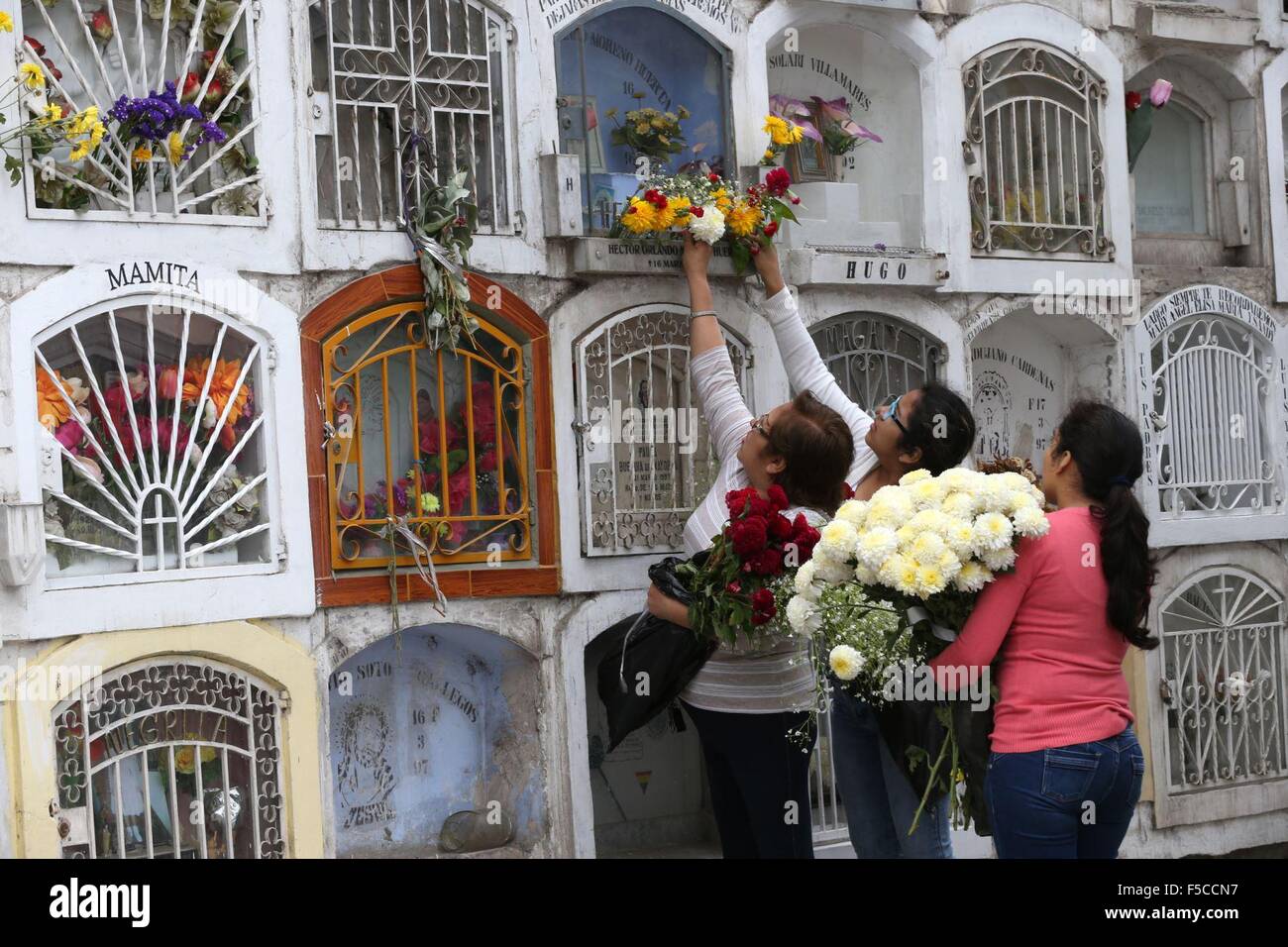 Lima, Peru. 1st Nov, 2015. People visit the El Angel cemetery during ...