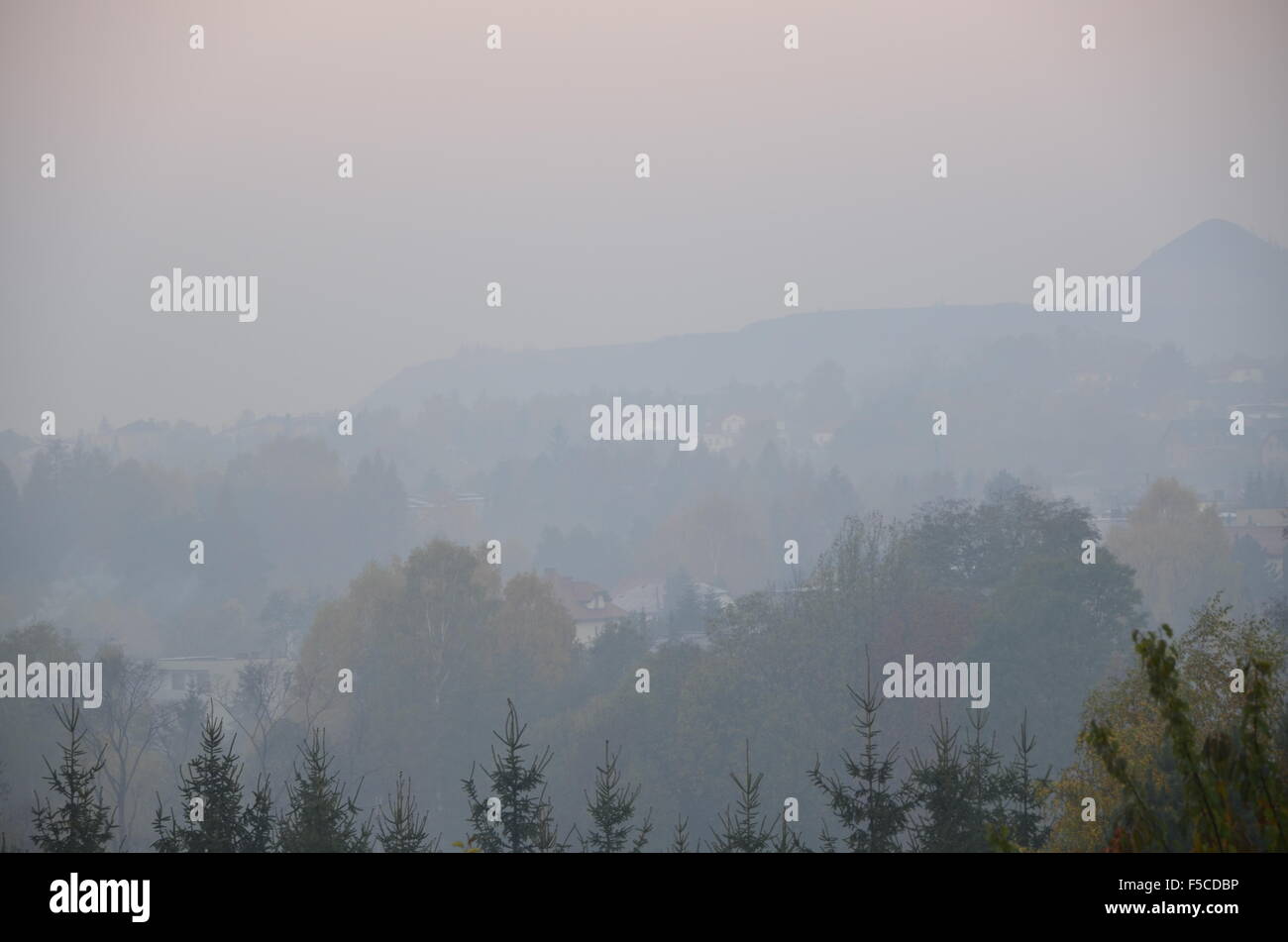 A view of a small town for a morning mist Stock Photo - Alamy