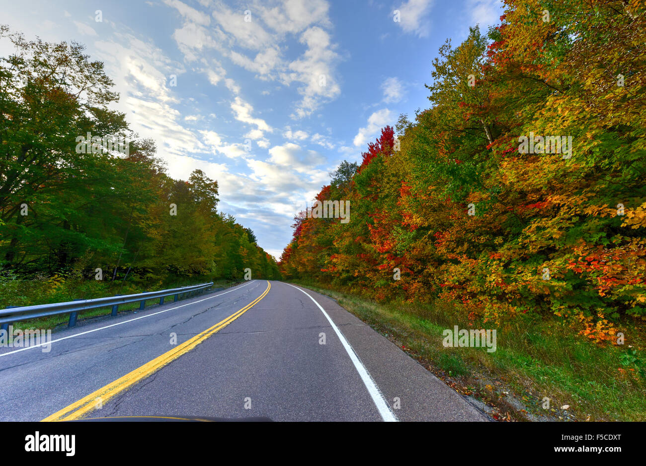 Peak fall foliage along the road through Smugglers Notch, Vermont Stock ...