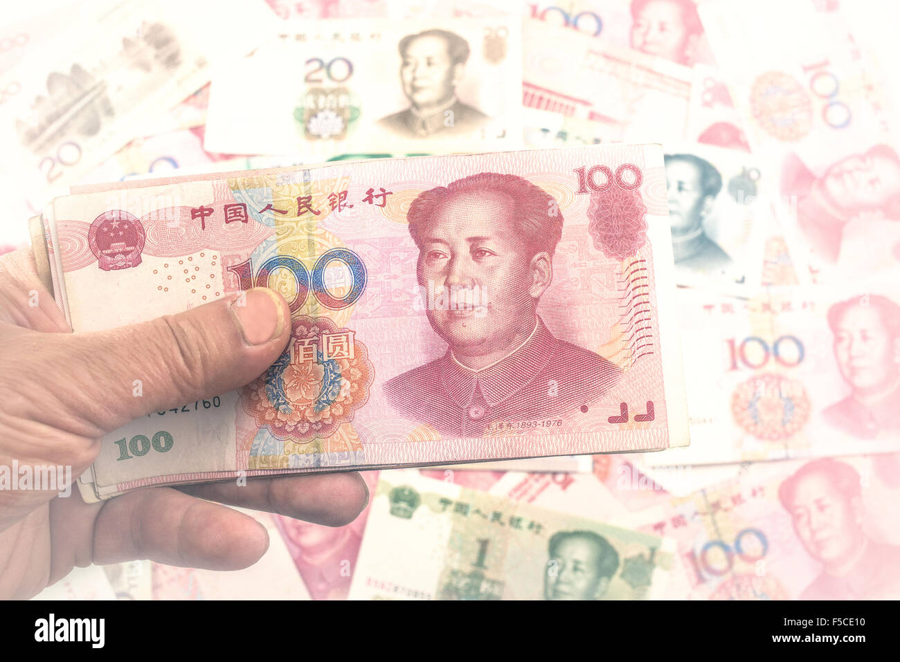 Handing Chinese RMB Stock Photo - Alamy